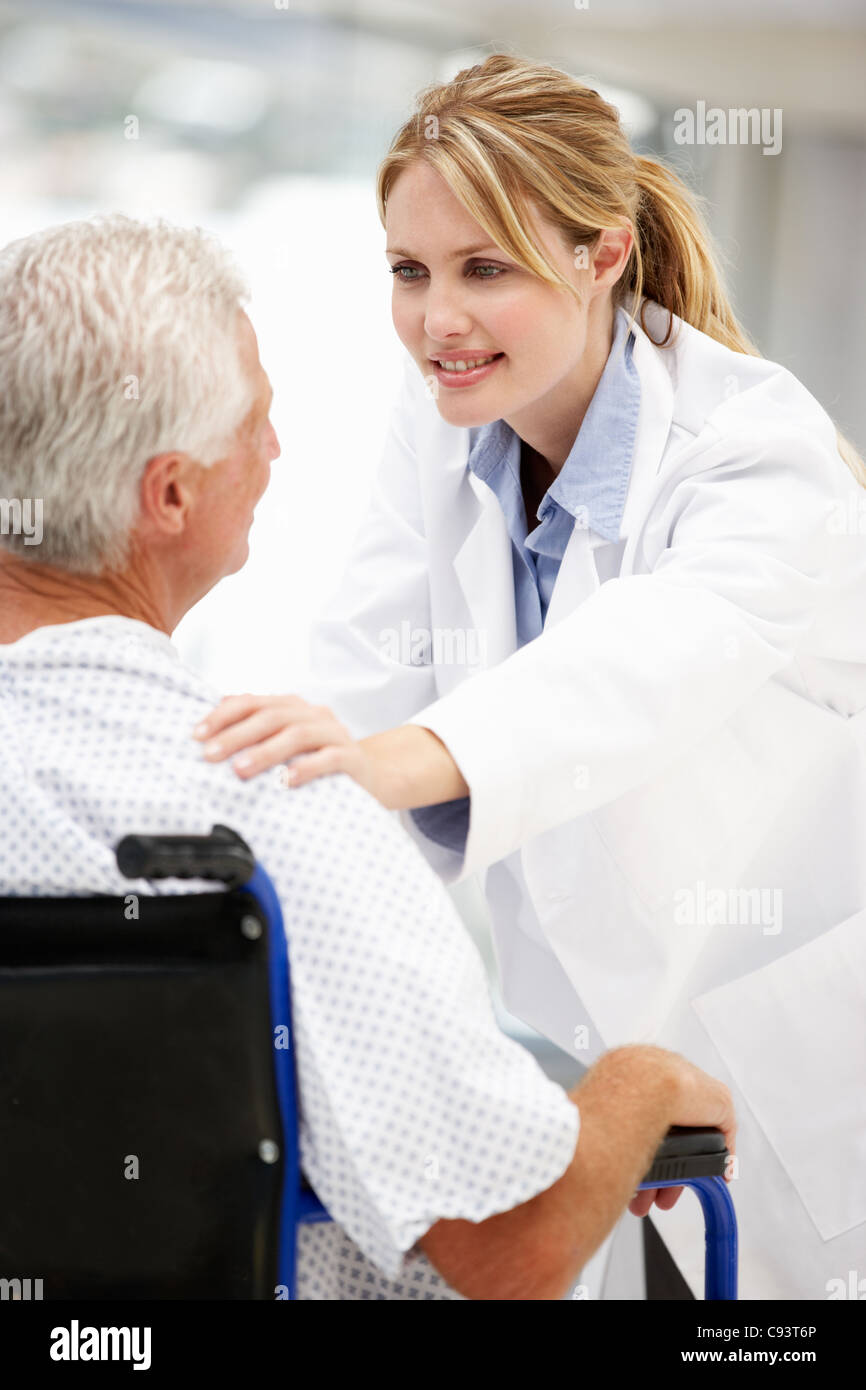 Senior patient with young doctor Stock Photo - Alamy