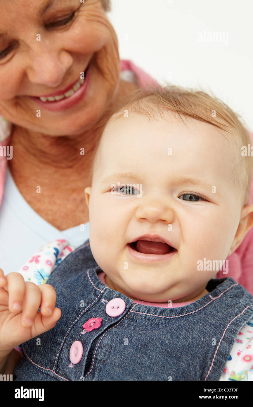 Portrait of senior woman with baby Stock Photo - Alamy