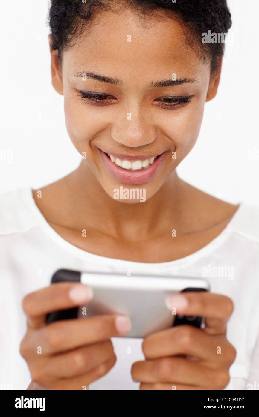 Young woman using mobile phone Stock Photo - Alamy