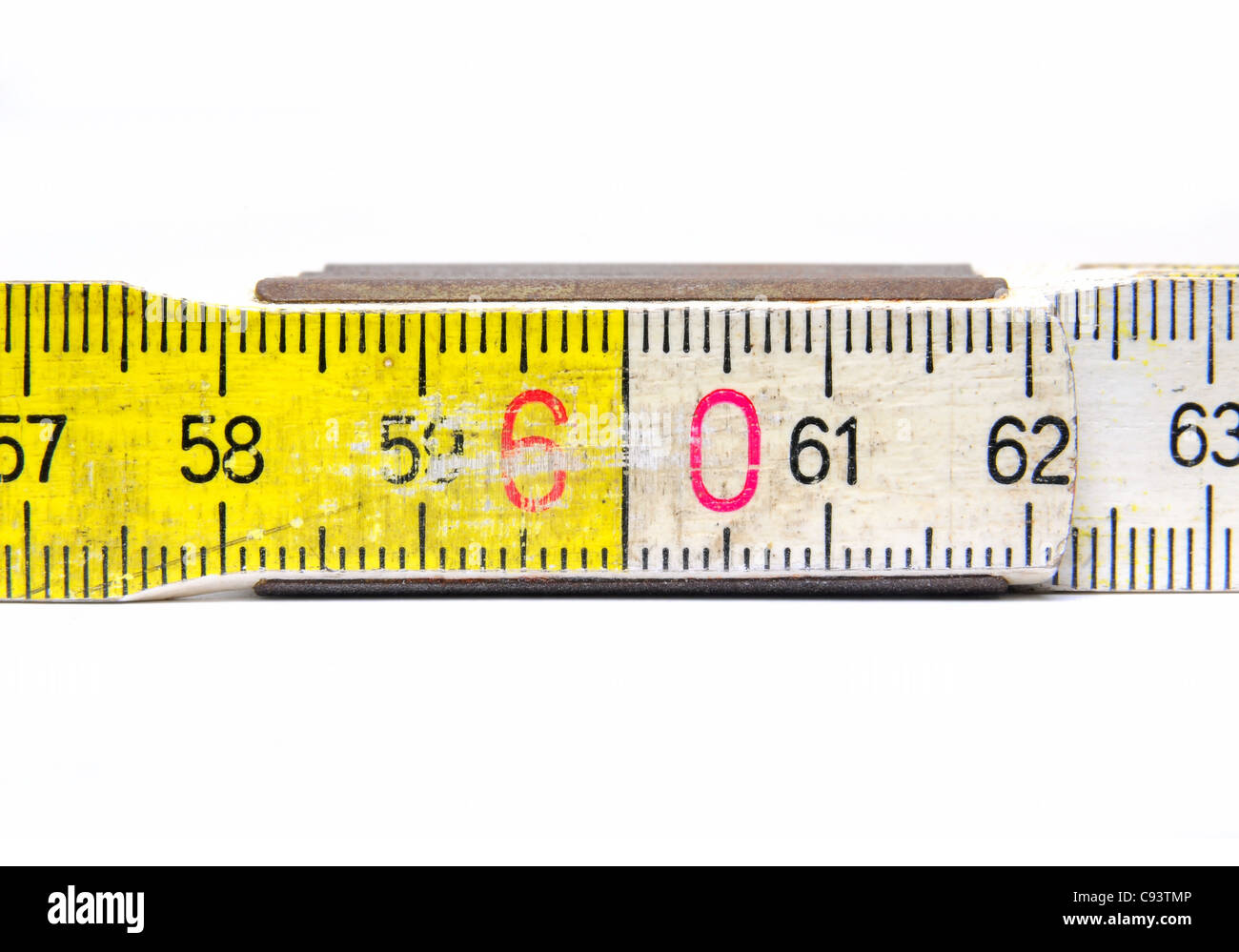 Yellow and white colored yardstick on white background Stock Photo - Alamy