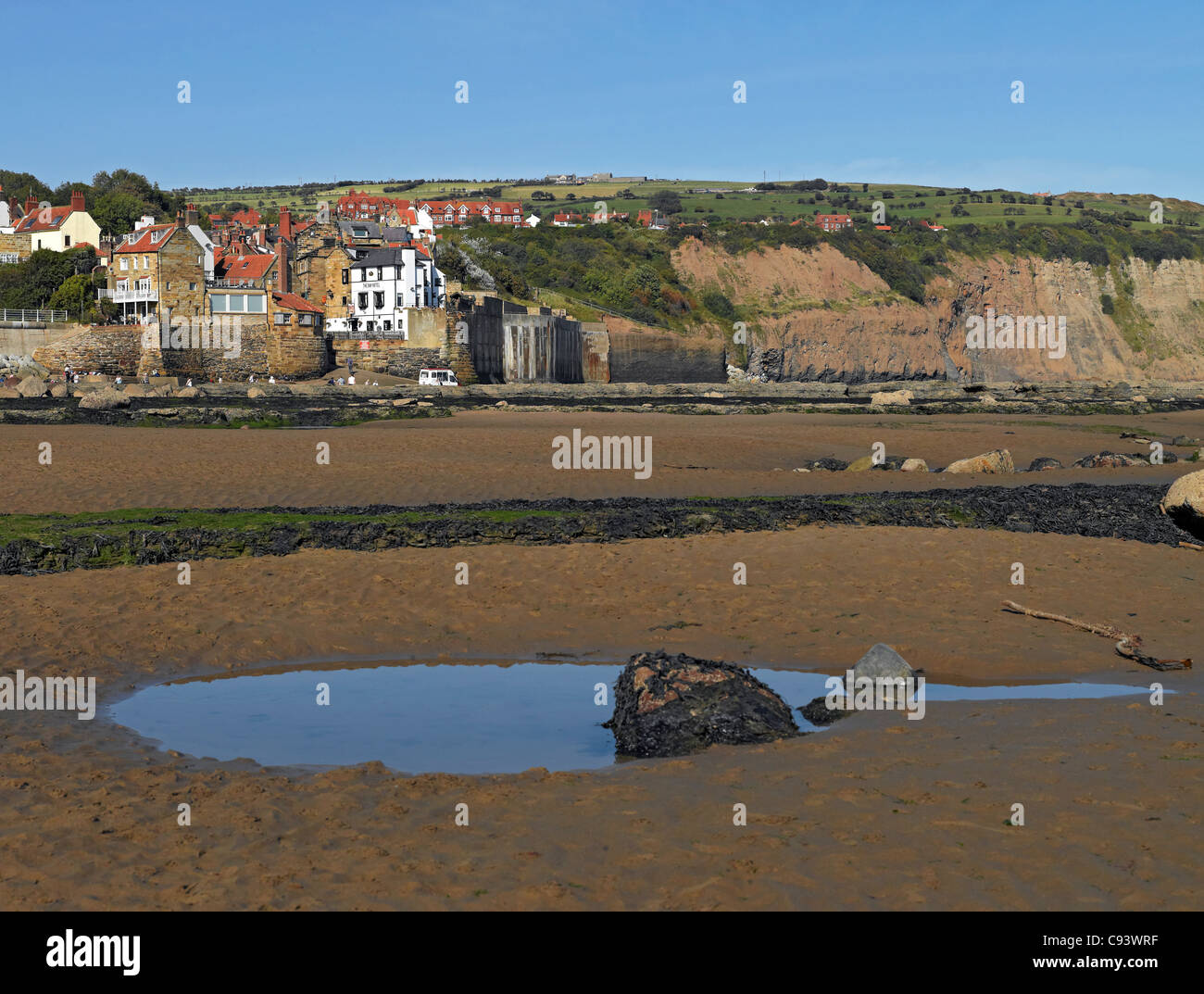 Fishing village of Robin Hoods Bay and beach in summer North Yorkshire ...