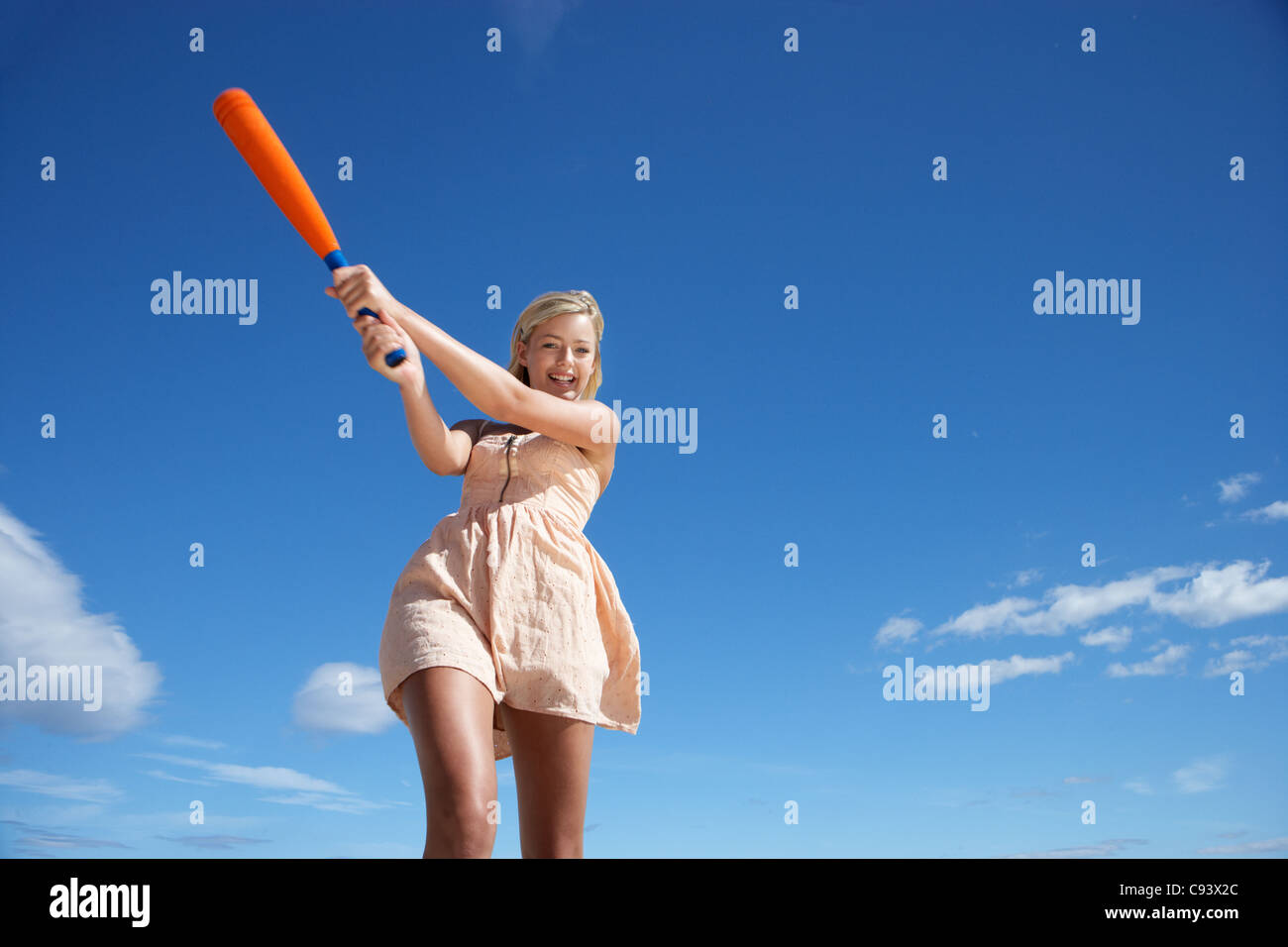 Girl hitting baseball hi-res stock photography and images - Alamy