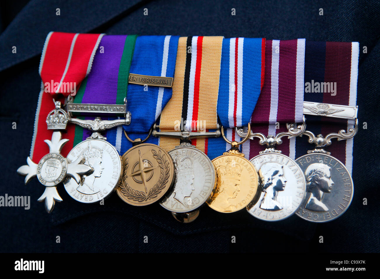 A member of the British Legion wears a medals at the Armistice Day ...