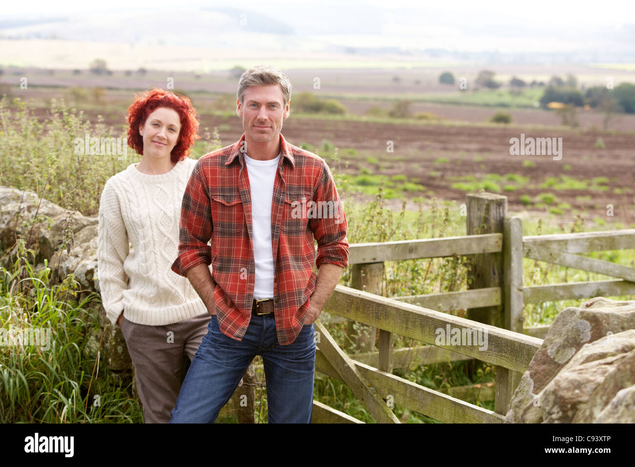 Couple in countryside Stock Photo - Alamy