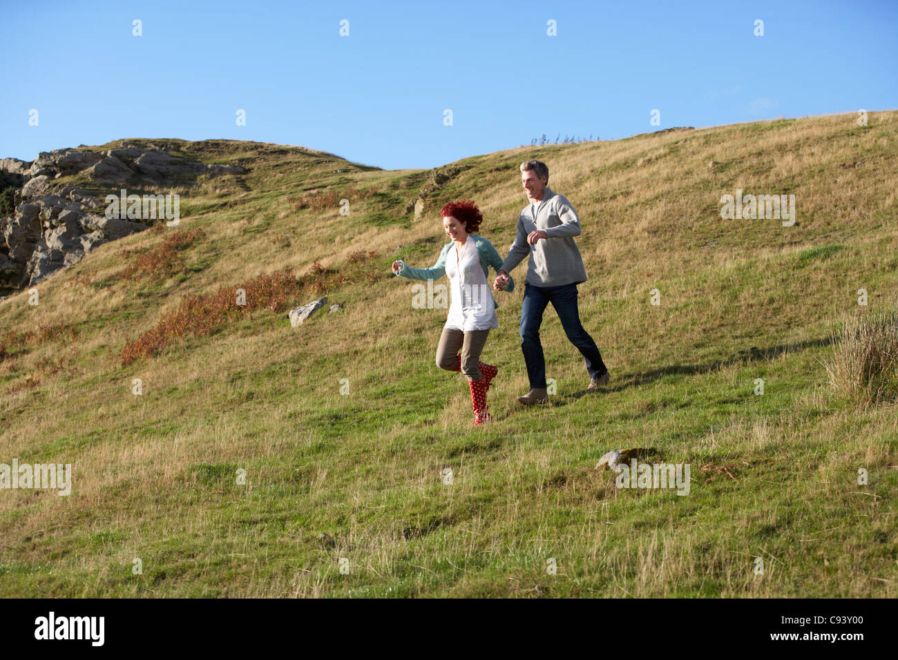 Couple in countryside Stock Photo - Alamy