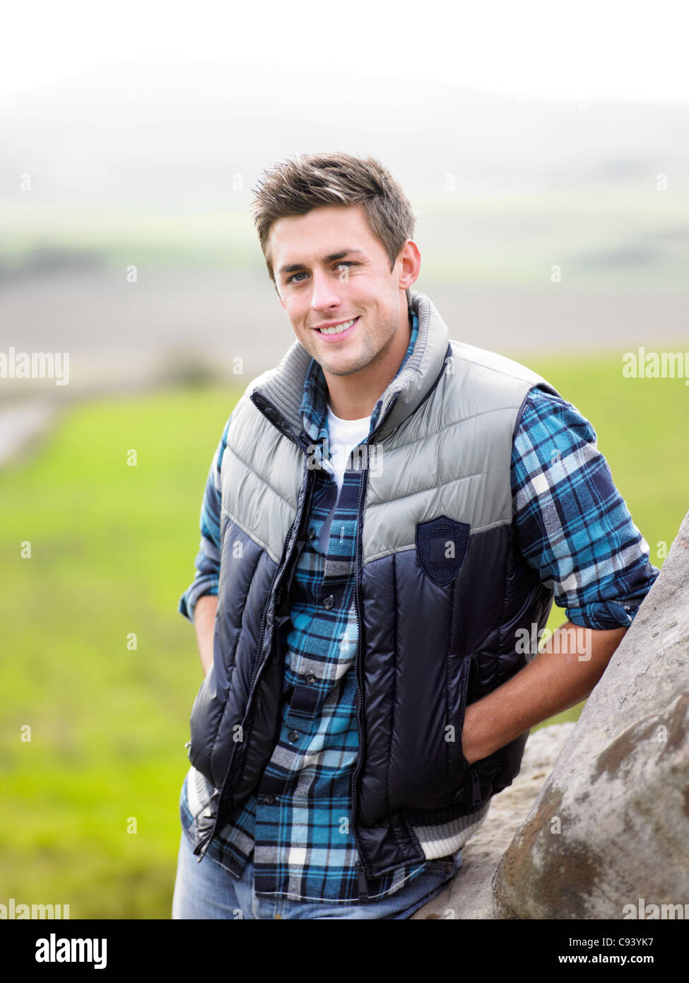 Young man in the country Stock Photo - Alamy