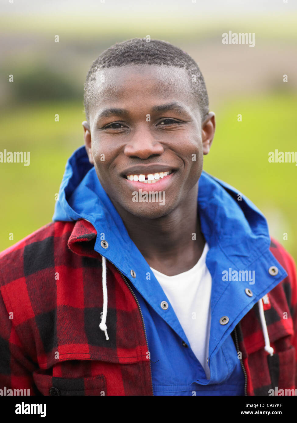 Young man in the country Stock Photo - Alamy