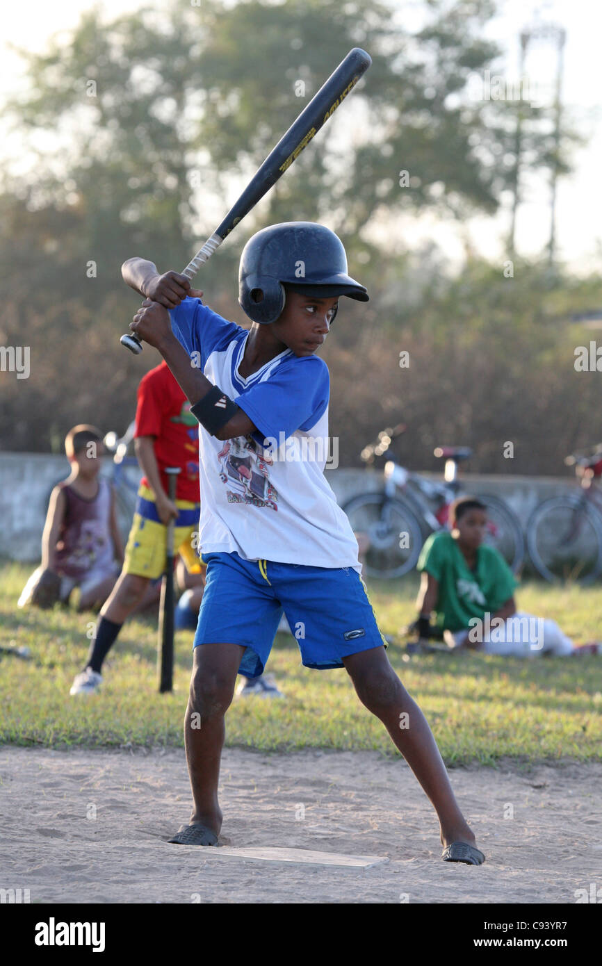 Cuban boy playing baseball in hi-res stock photography and images - Alamy