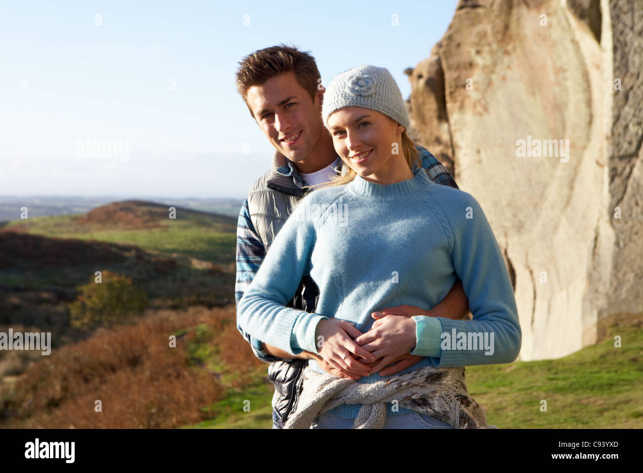 Young couple on country walk Stock Photo - Alamy