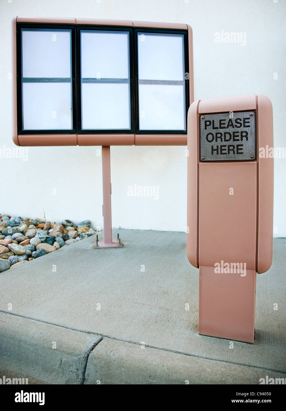 Fast food drive thru order here sign hi-res stock photography and ...