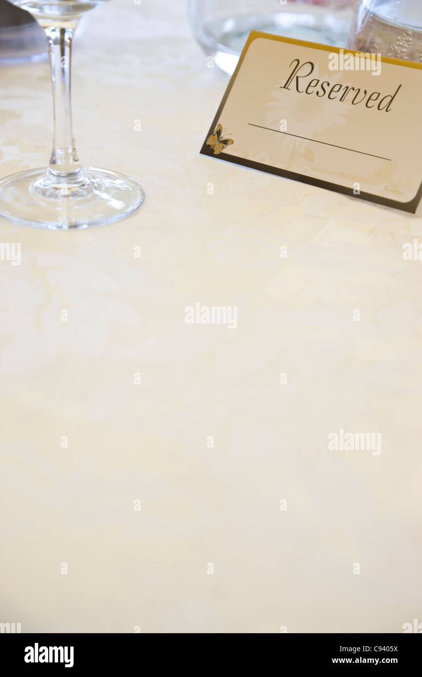 Place Setting and Reserved Sign Stock Photo - Alamy
