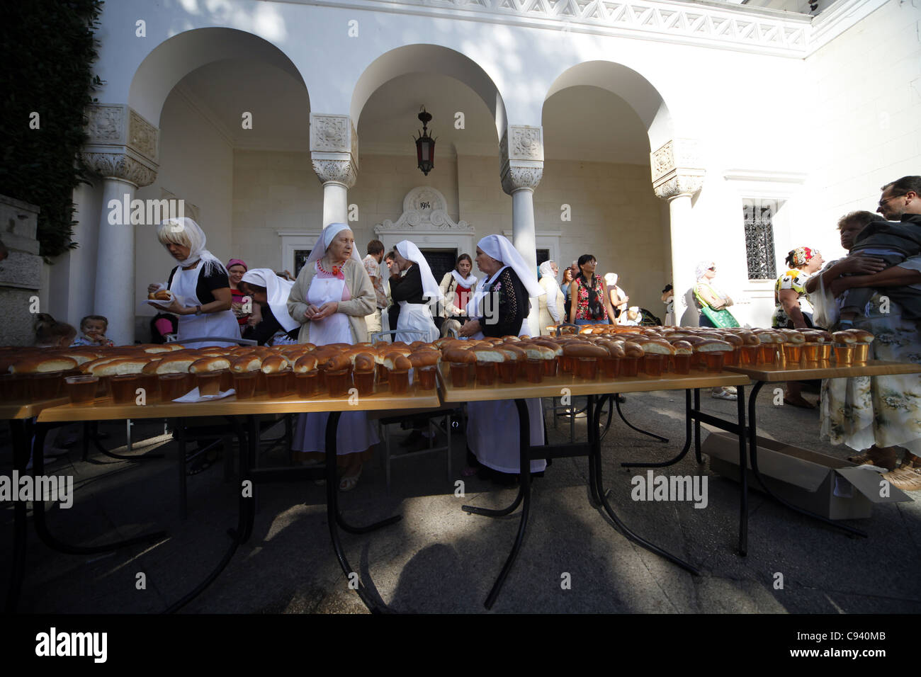 NUNS GIVE OUT BREAD AT ROMANOV CHAPEL OF THE HOLY & LIFE-GIVING CROSS ...