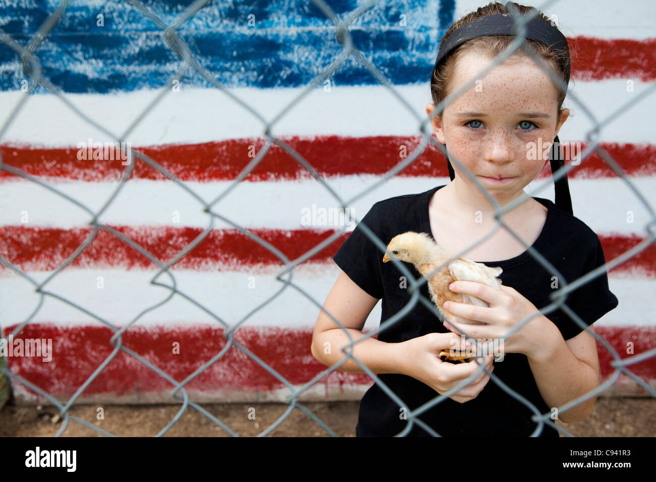 Girl chain link fence hi-res stock photography and images - Alamy