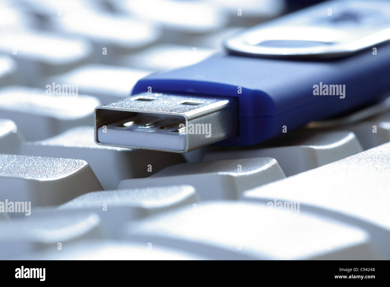 USB flash drive on laptop keyboard Stock Photo - Alamy
