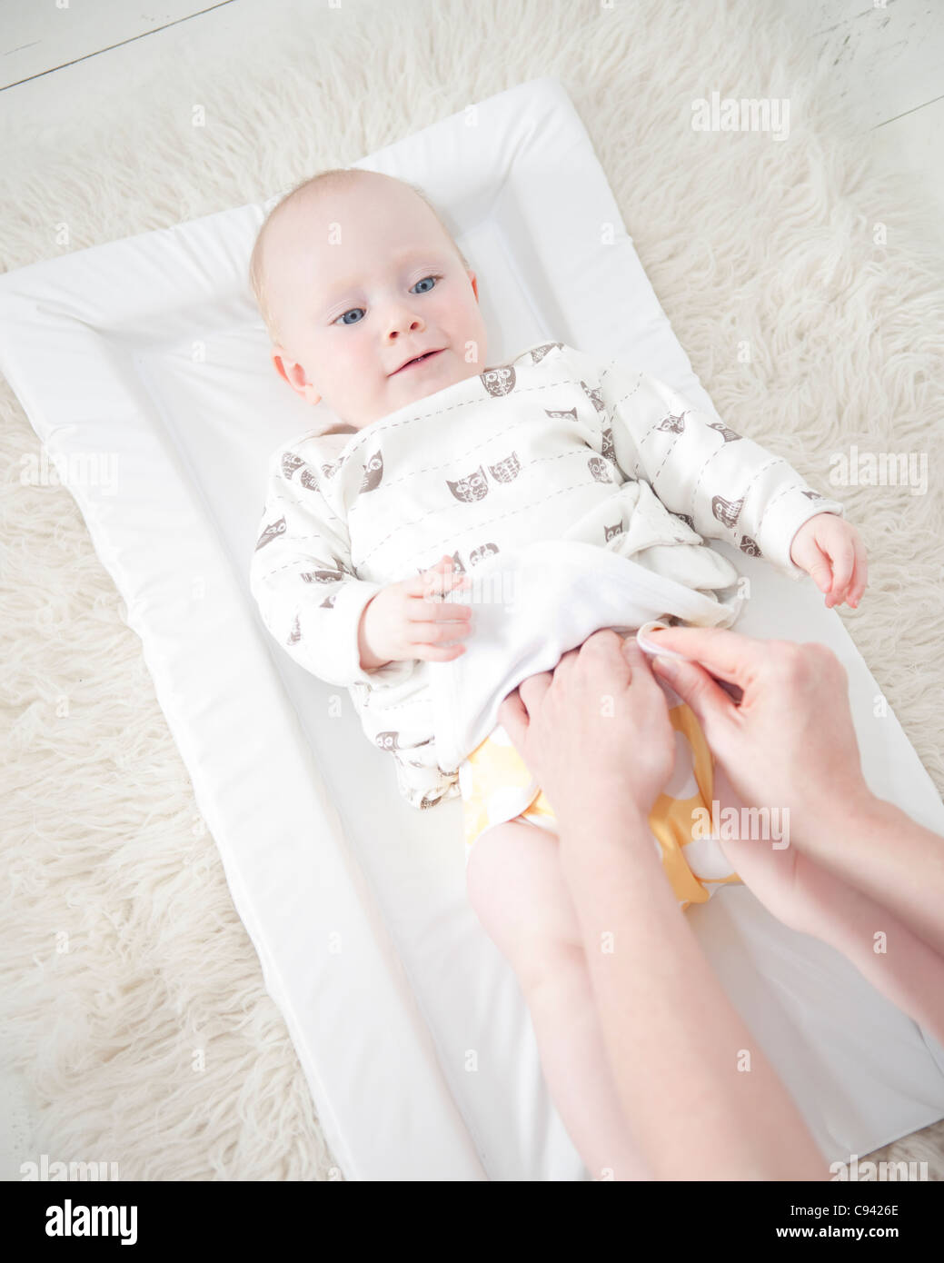 Mother Changing Nappy Diaper Toddler High Resolution Stock Photography ...