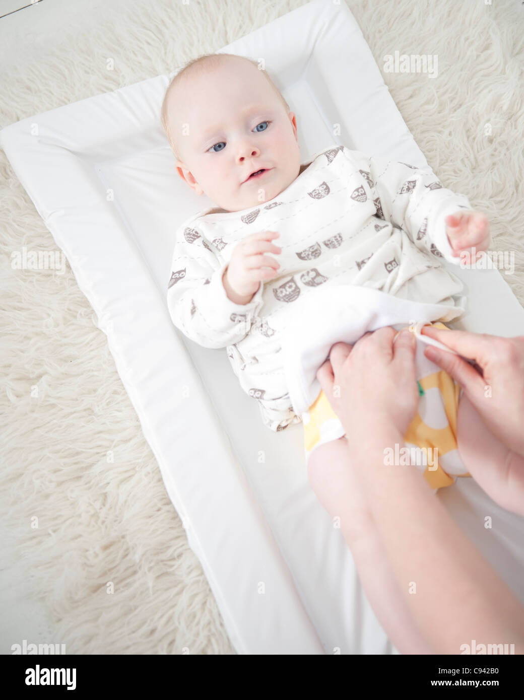 Children changing nappy hi-res stock photography and images - Alamy