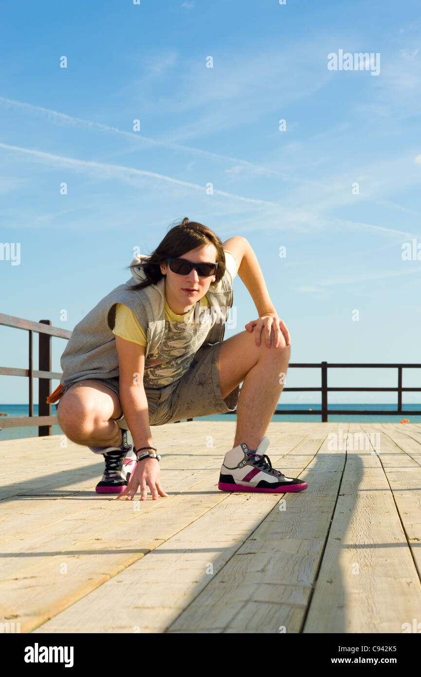 Cool teenager in a very dynamic attitude Stock Photo - Alamy