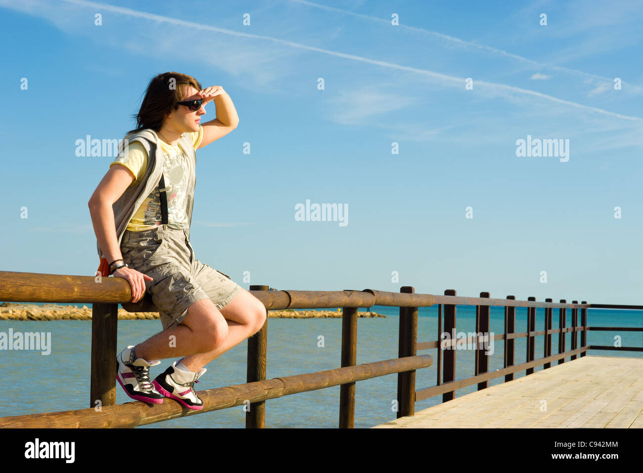 Teen looking out towards the horizon, a future concept Stock Photo - Alamy