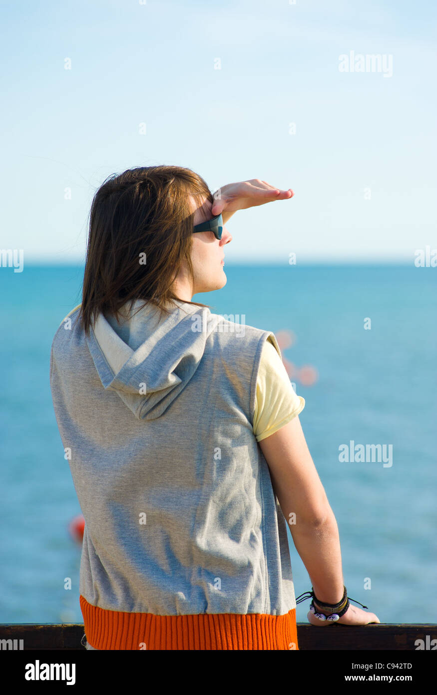 Teen looking out towards the horizon, a future concept Stock Photo - Alamy