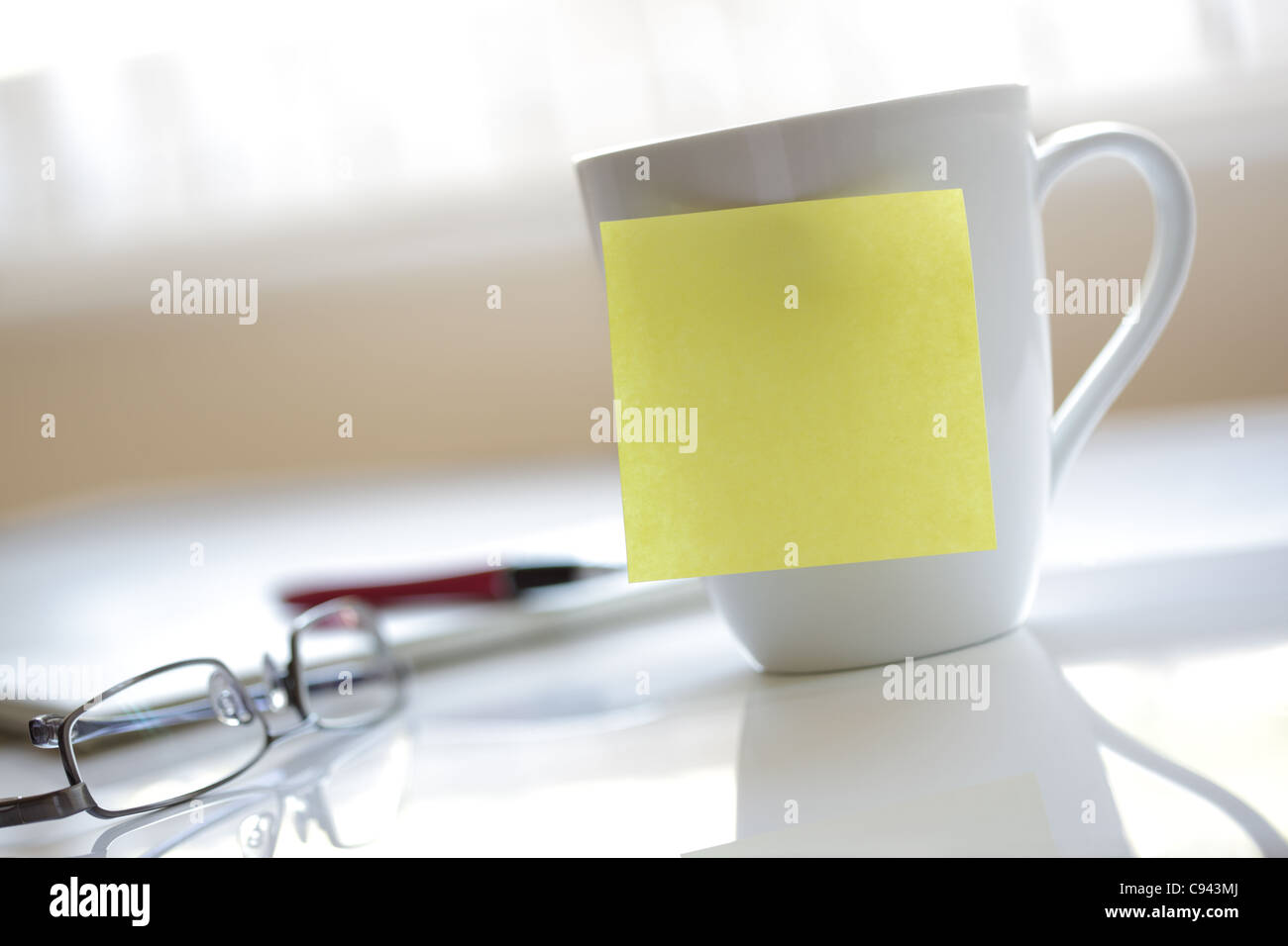 Office yellow sticky note Stock Photo - Alamy