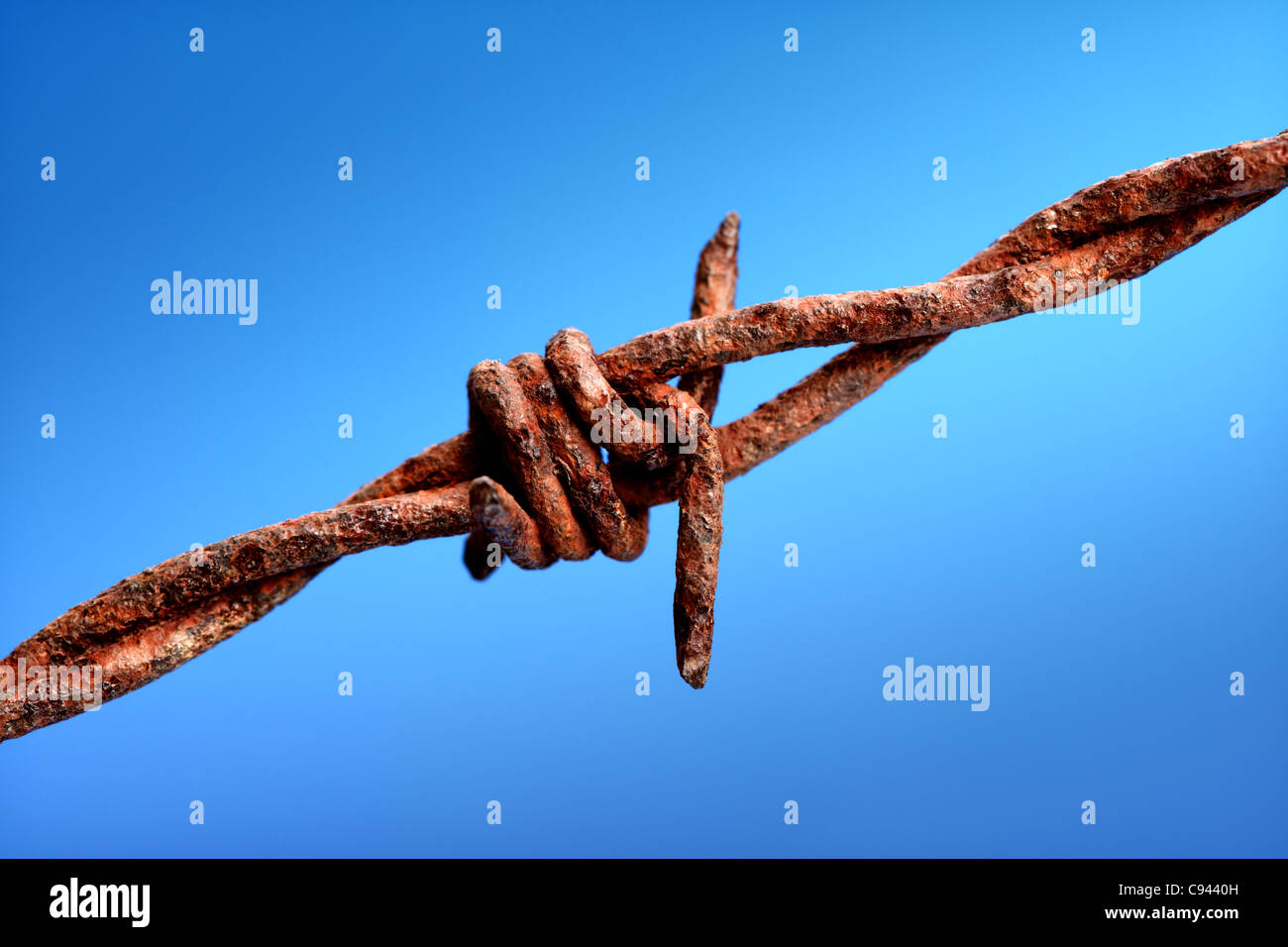 Rusty barbed wire Stock Photo - Alamy