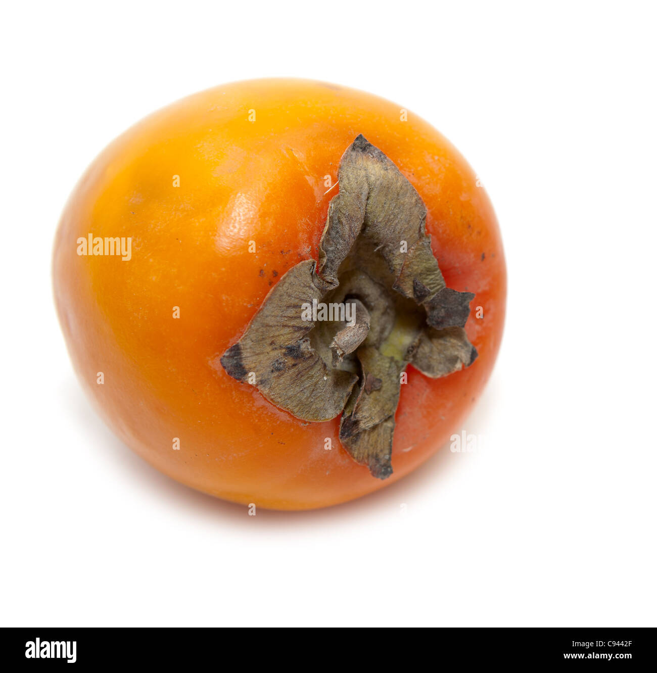 Red juicy persimmons isolated on white background Stock Photo - Alamy