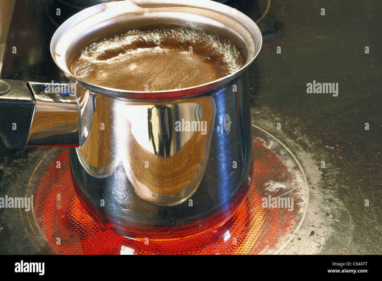 pot with armenian coffee on the cooking stove Stock Photo - Alamy