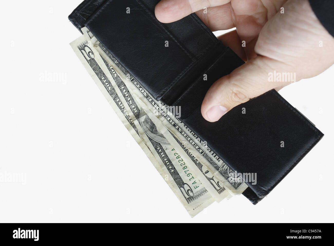 full wallet on the white background Stock Photo - Alamy