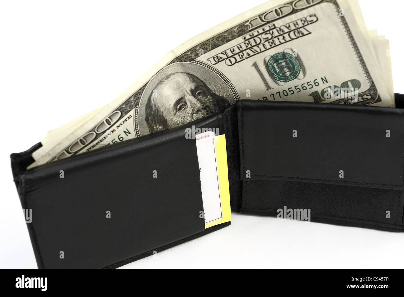 full wallet on the white background Stock Photo - Alamy
