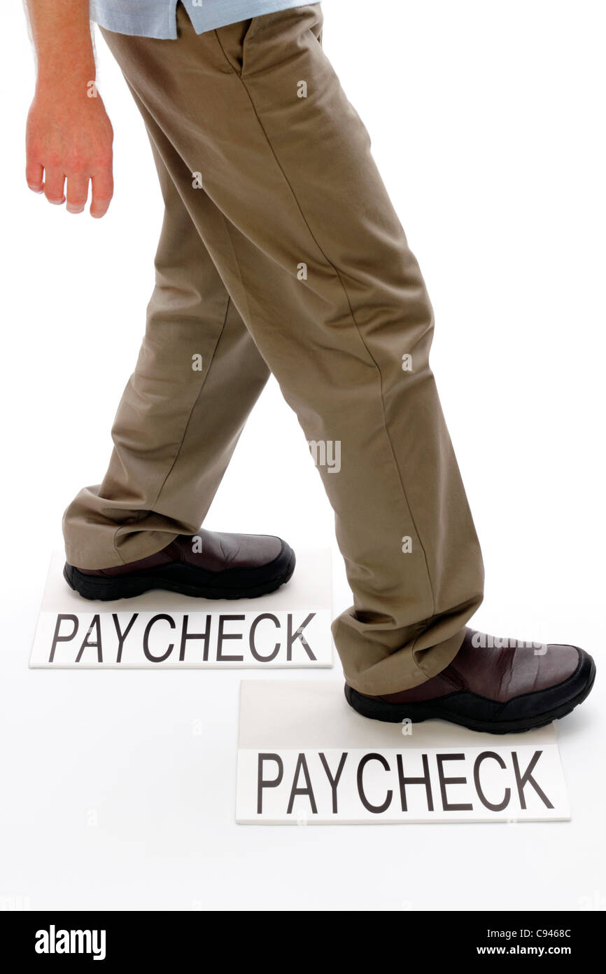 Person walking from one light gray rectangle paper packet marked ...