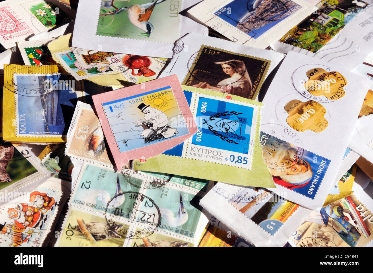 Assortment of used postage stamps Stock Photo - Alamy
