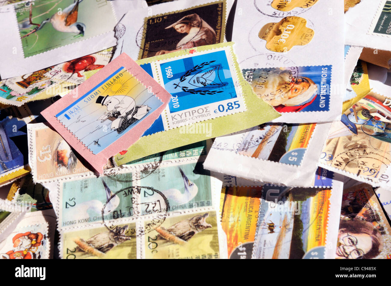 Assortment of used postage stamps Stock Photo - Alamy