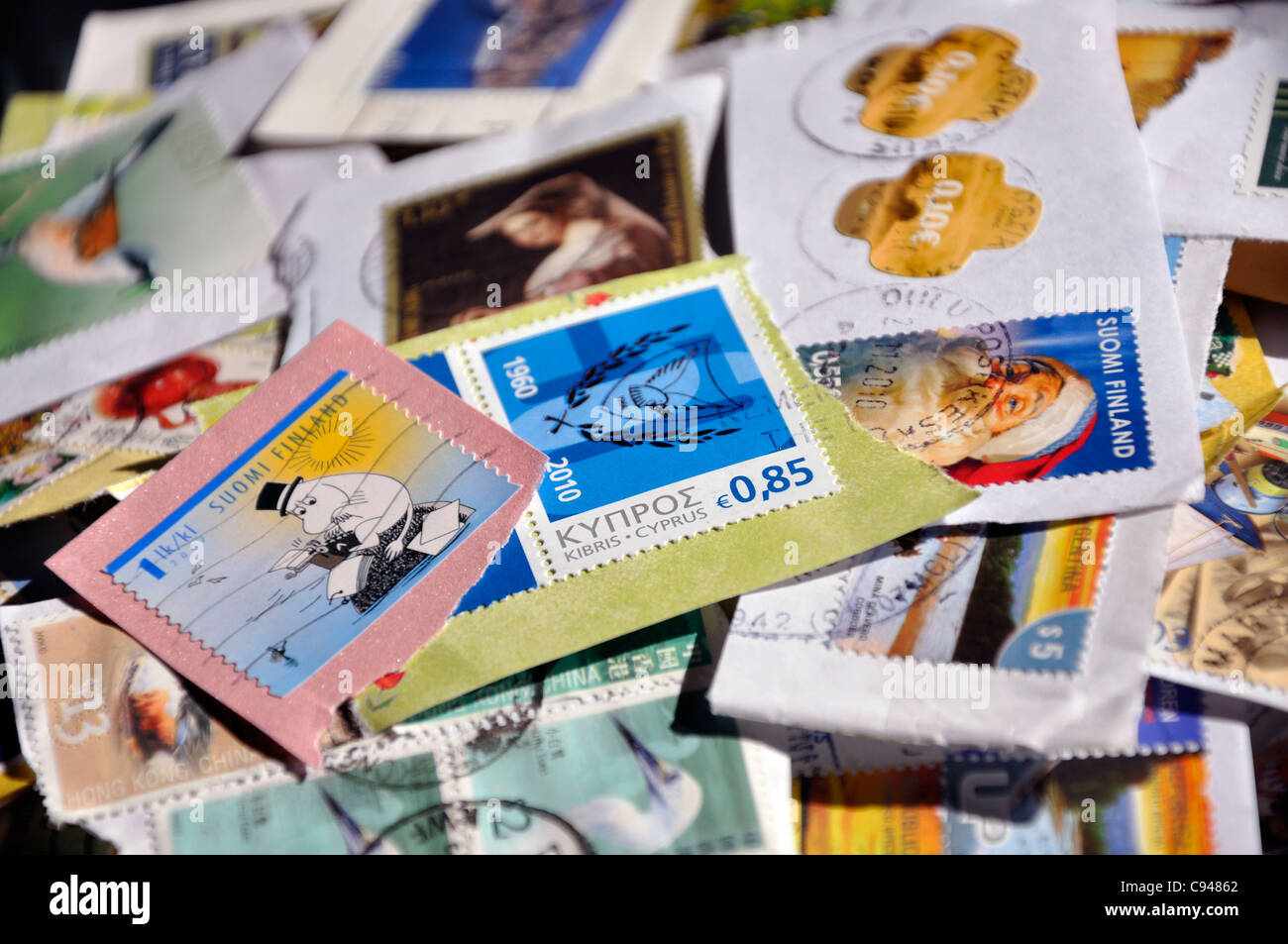 Assortment of used postage stamps Stock Photo - Alamy