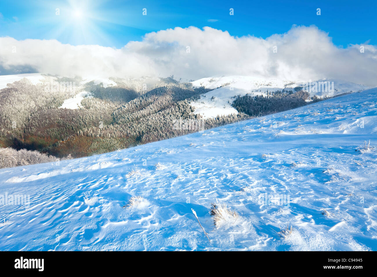 October mountain view with first winter snow and last autumn colourful ...