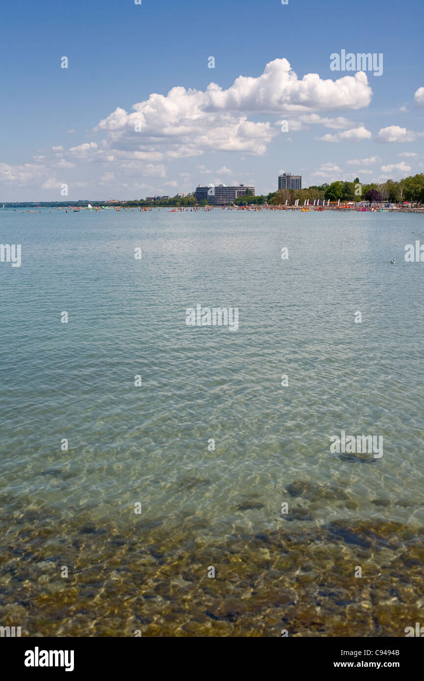 Distant View of summer beach resort on lake Balaton Stock Photo - Alamy