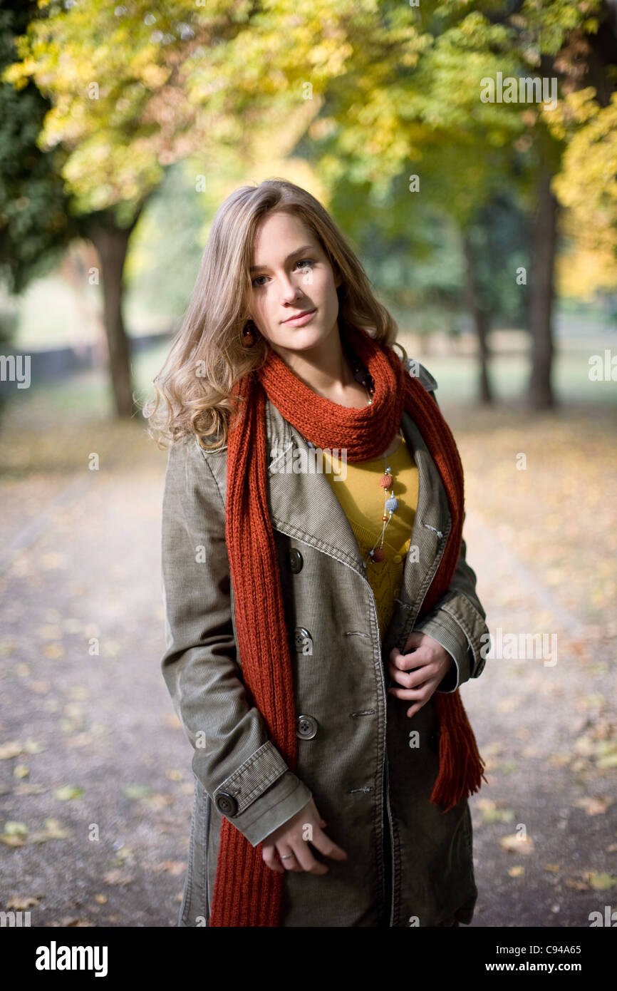 Half length portrait of stylish autumn fashion girl in the park Stock ...