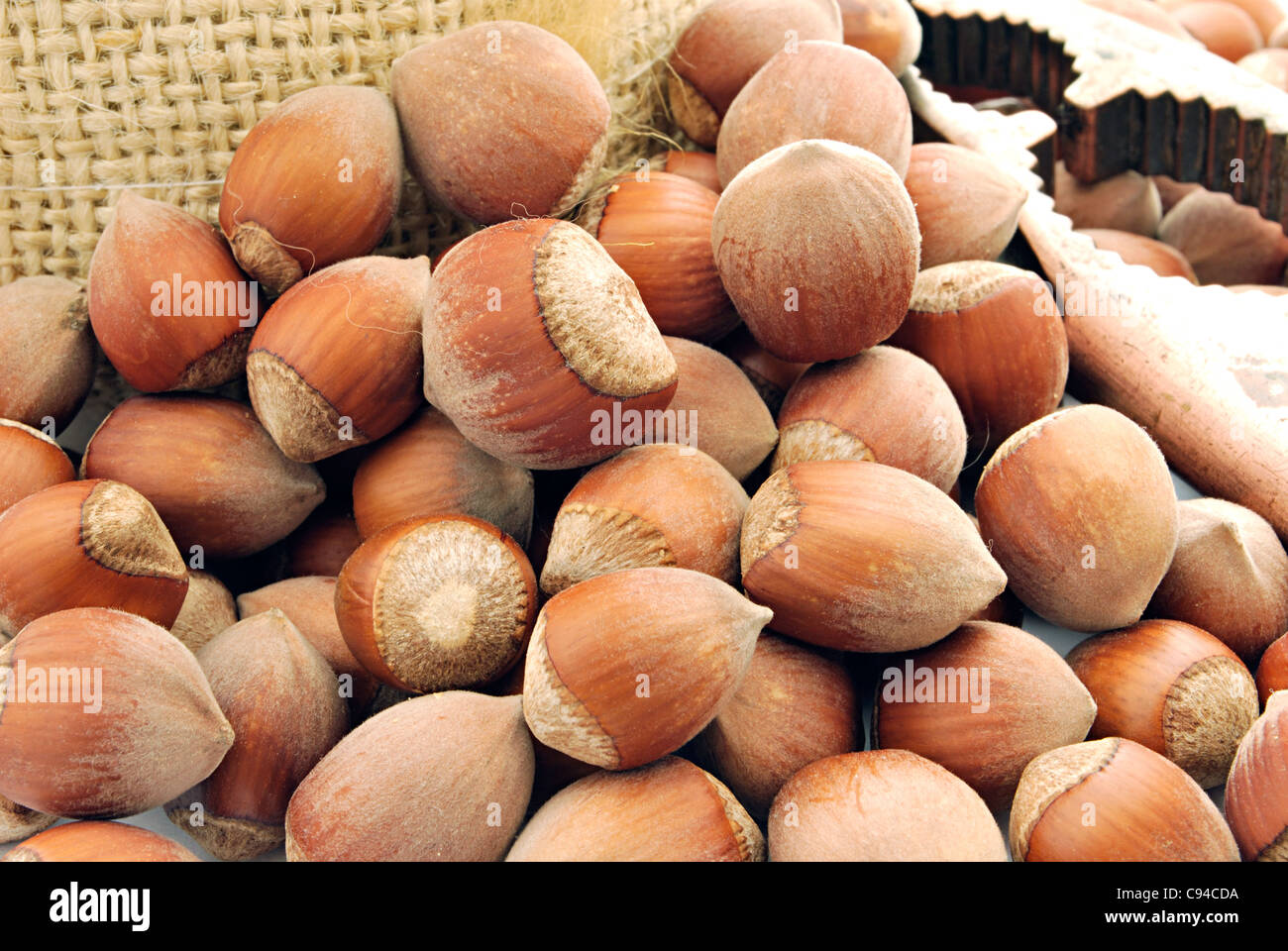 nutcracker and heap of hazelnuts Stock Photo - Alamy
