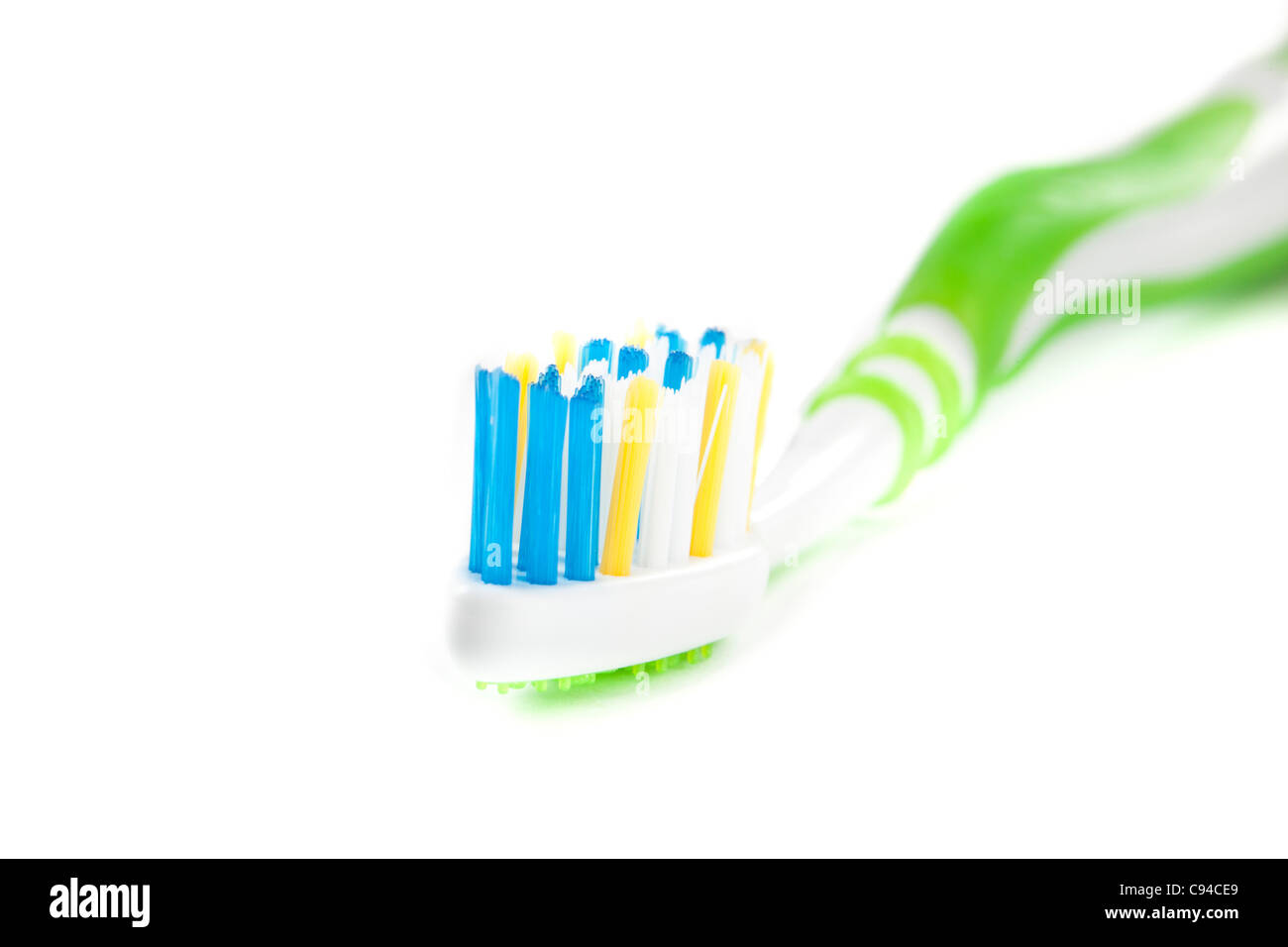 One Green Toothbrush on White Isolated Background Stock Photo - Alamy