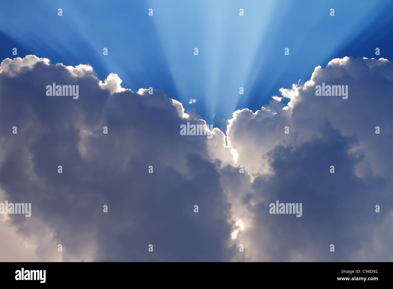 Clouds with beautiful lightrays Stock Photo - Alamy