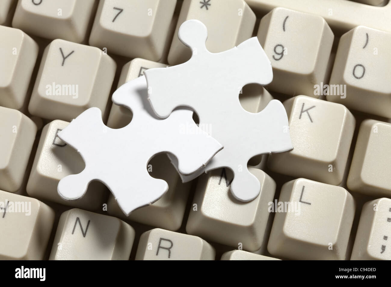Computer Keyboard and Puzzle,concept of Solution Stock Photo - Alamy