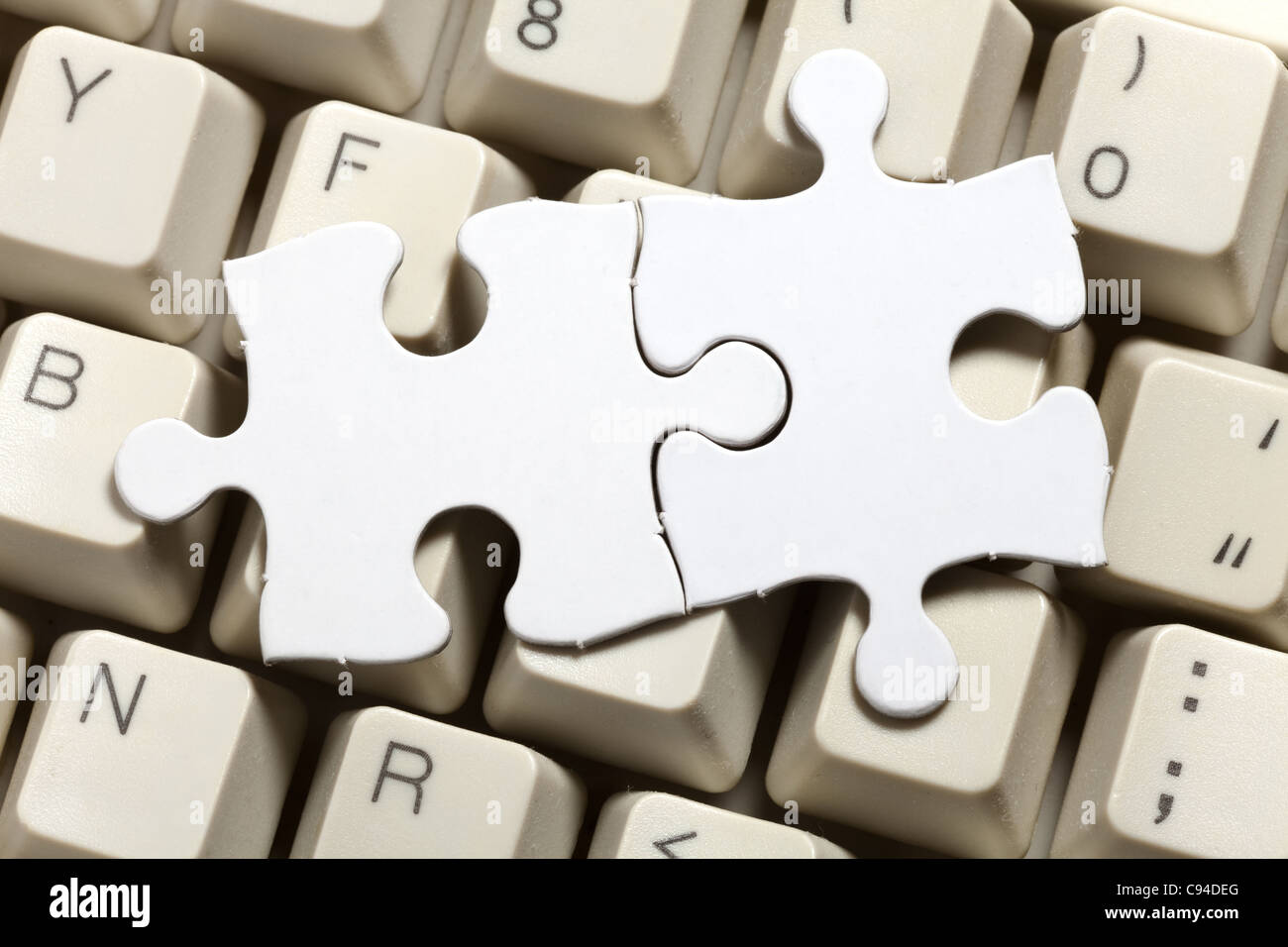 Computer Keyboard and Puzzle,concept of Solution Stock Photo - Alamy
