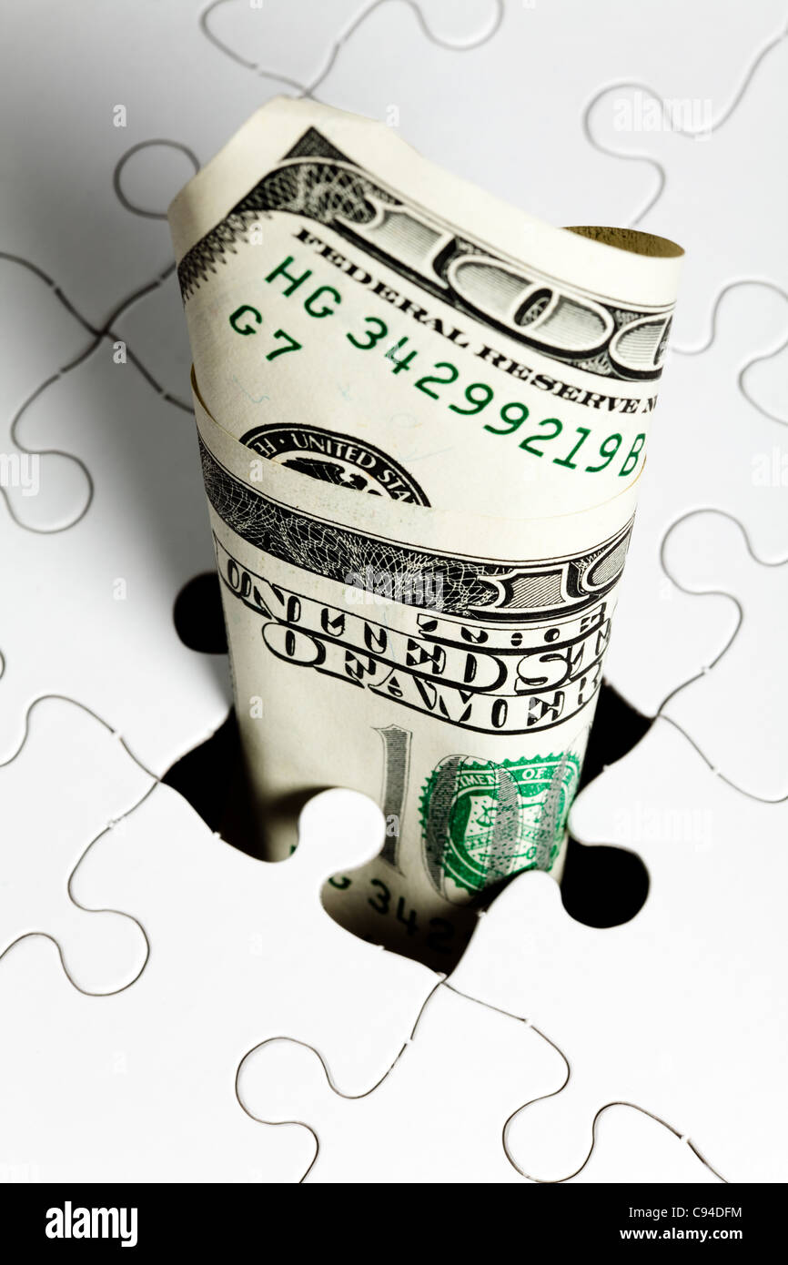 Dollar puzzle hi-res stock photography and images - Alamy