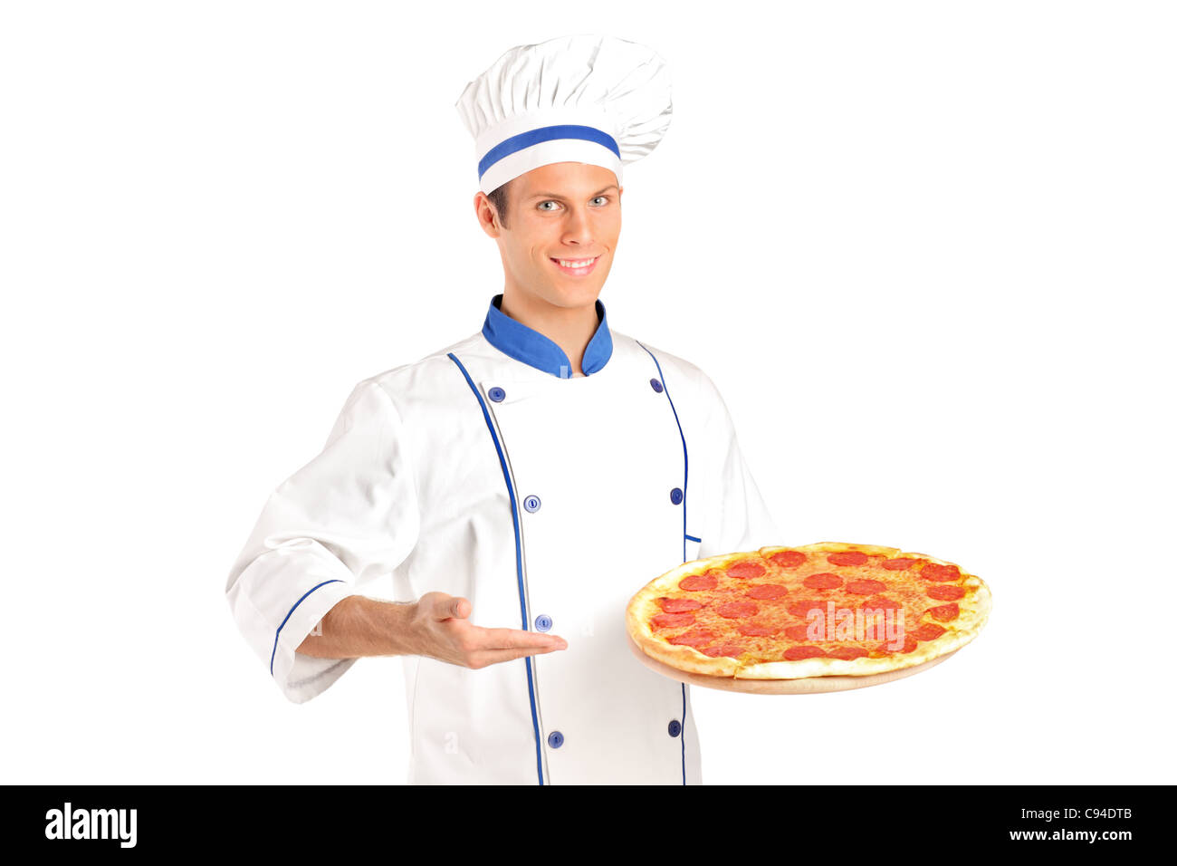 A young chef holding a pizza Stock Photo - Alamy