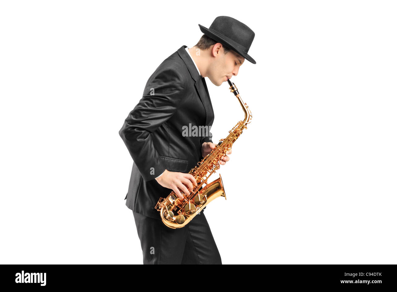 A young man playing on saxophone Stock Photo - Alamy
