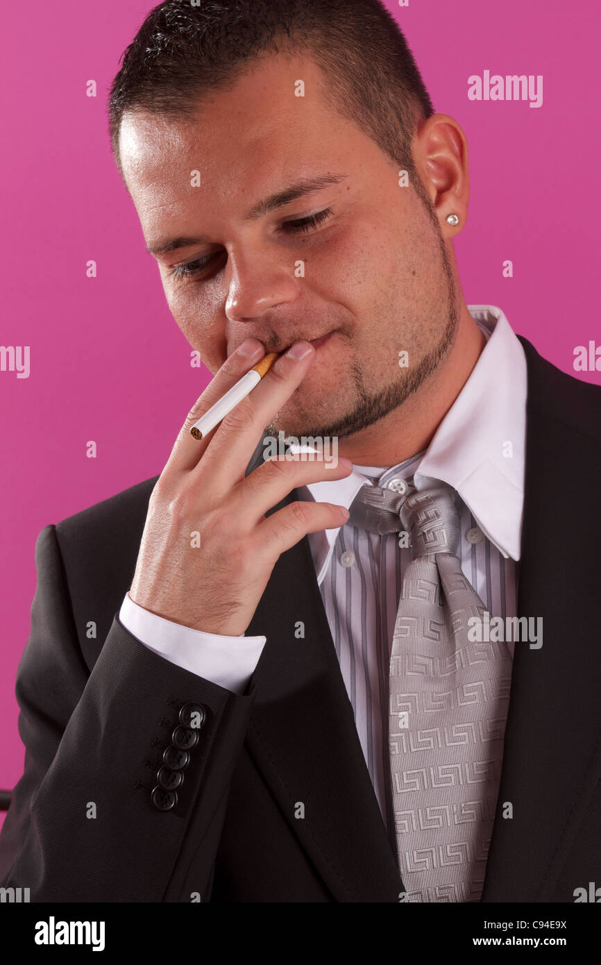 business man smoking cigarette Stock Photo - Alamy