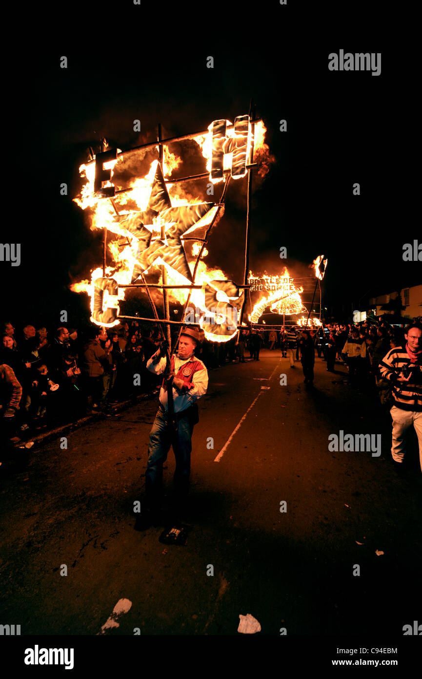 Bonfire procession for Remembrance. East Hoathly, East Sussex, UK 12/11 ...