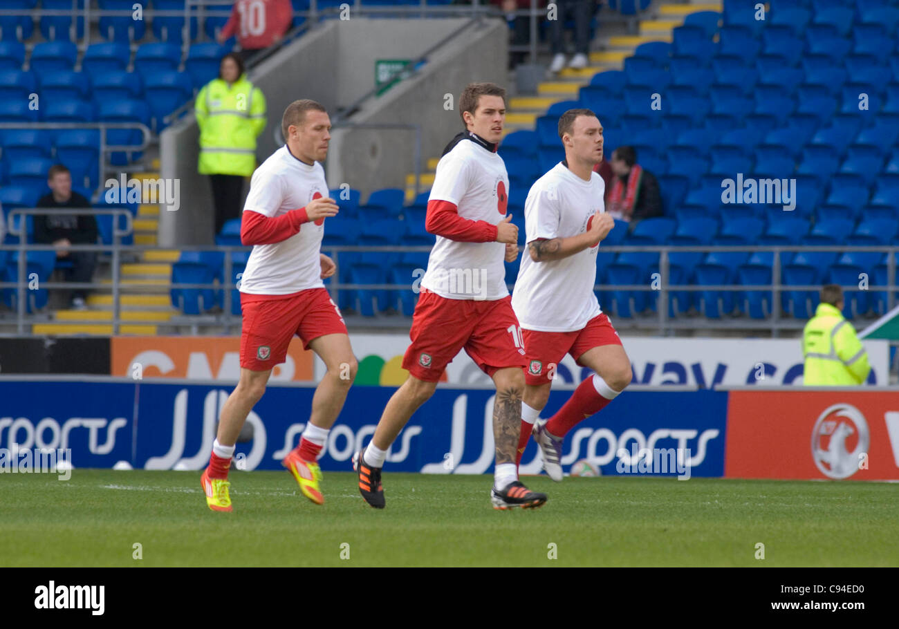 Wales's Craig Bellamy, Aaron Ramsey and Darcy Blake warming up. Wales v ...