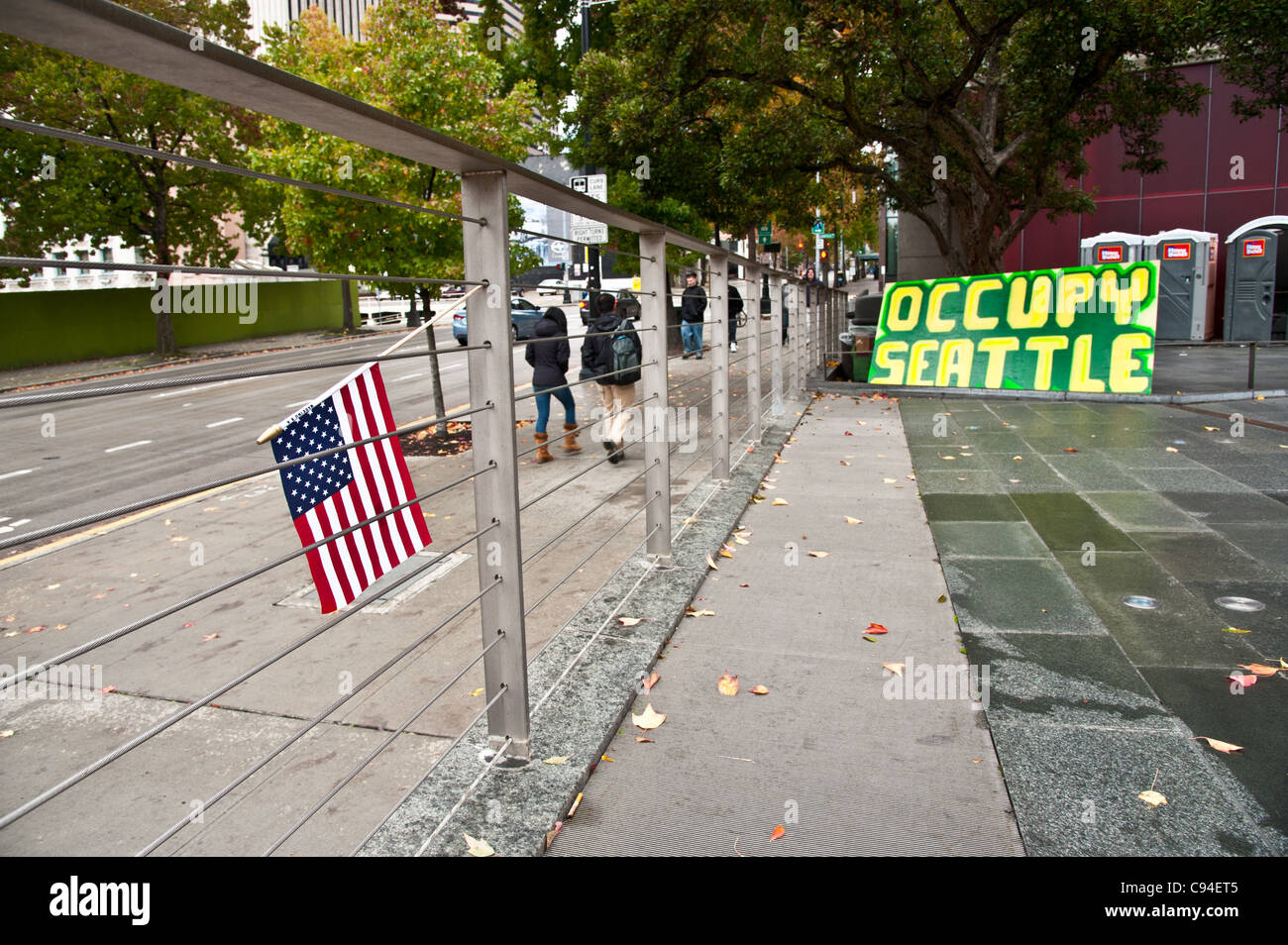 A "Occupy Seattle" sign and an American flag Stock Photo - Alamy