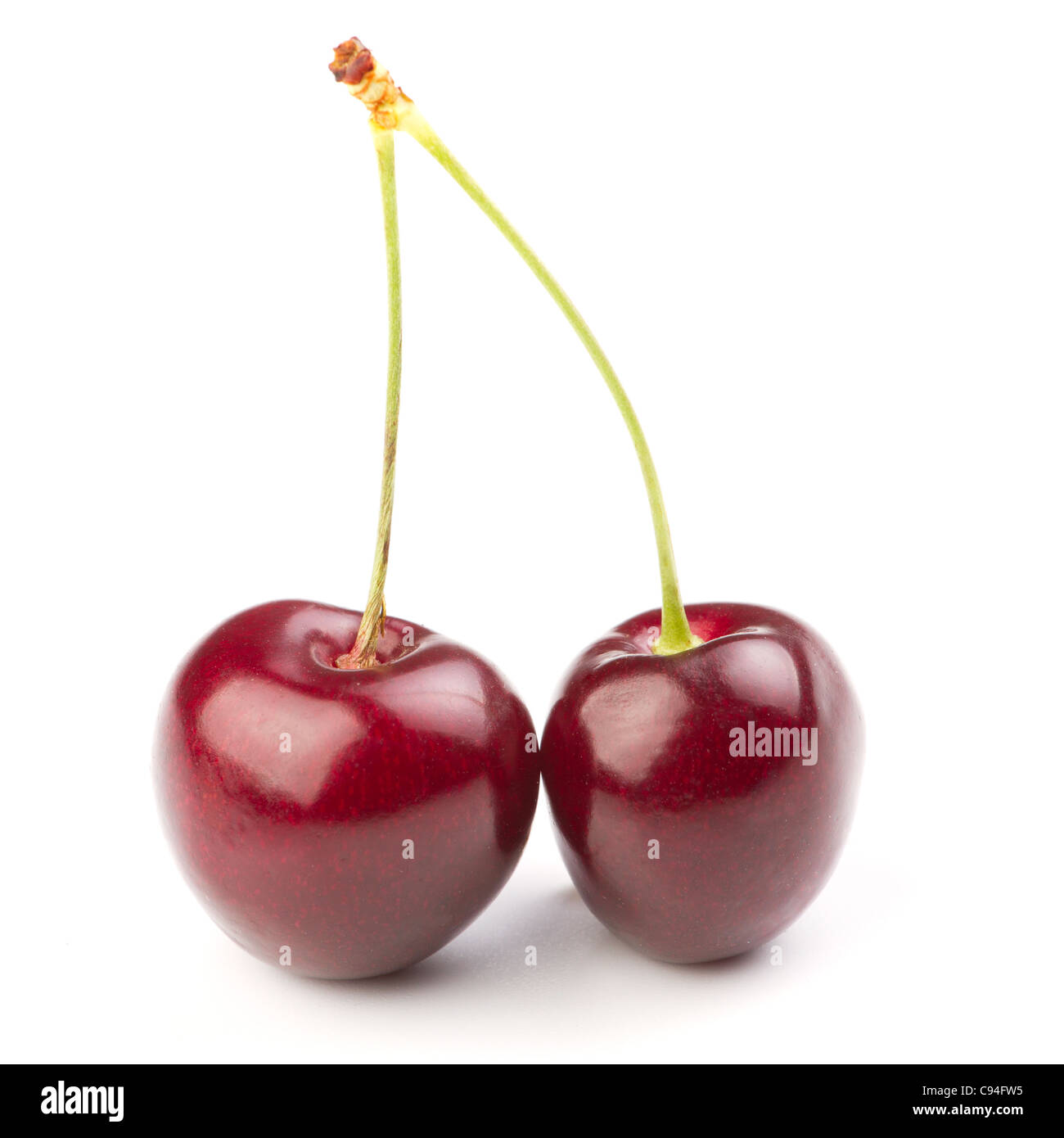 Red ripe cherries over white background Stock Photo - Alamy