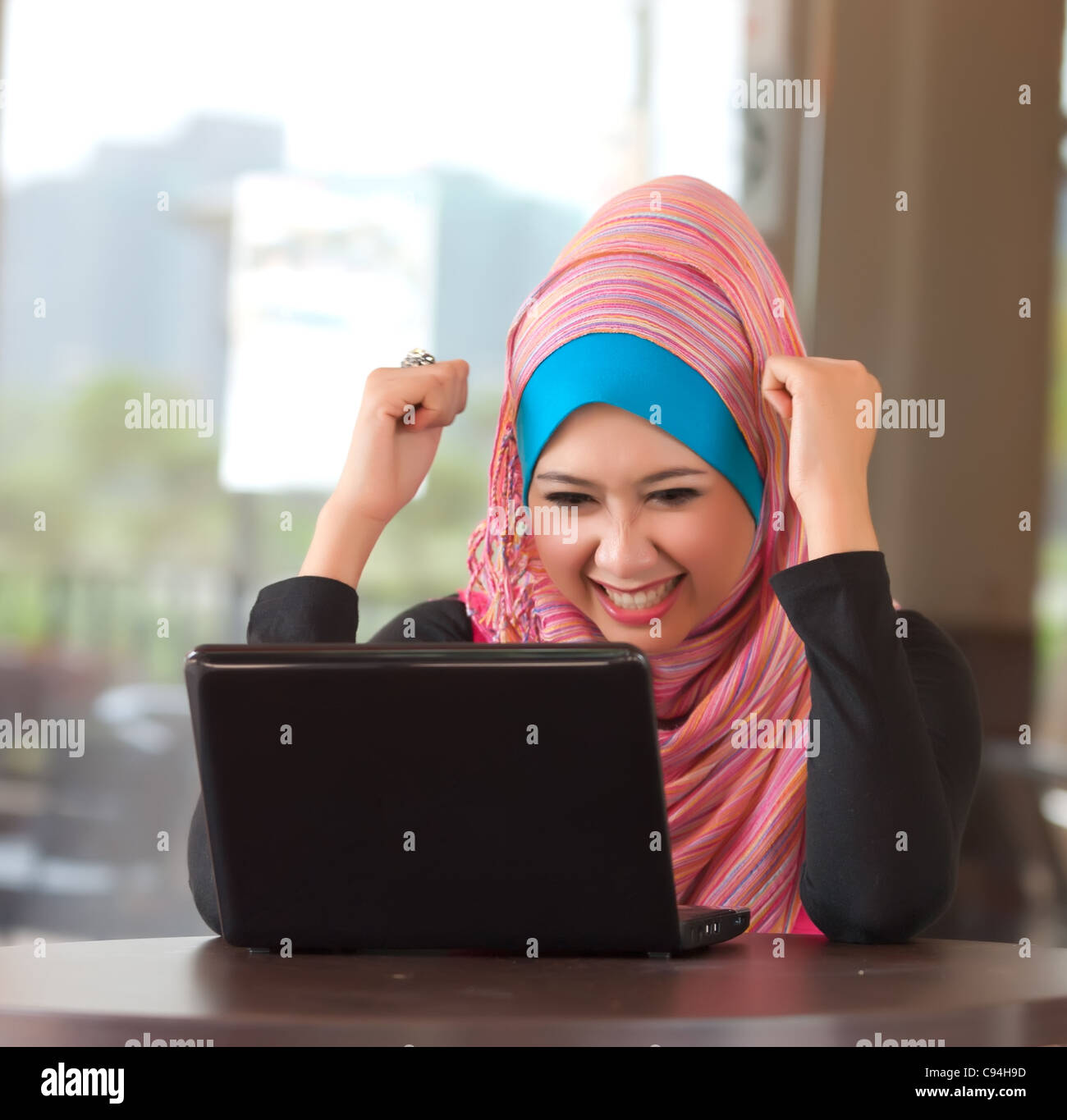 Expression of the successful muslim women Stock Photo - Alamy